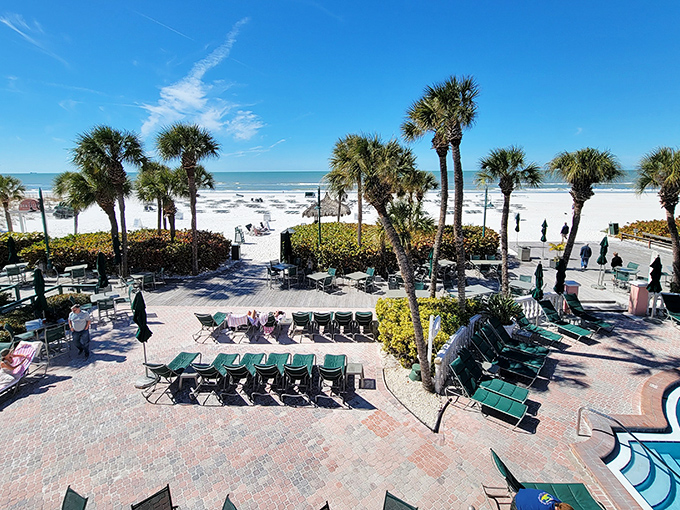 St. Pete Beach unfurls its sugar-white sands just steps from the hotel, where beach chairs await and the Gulf of Mexico sparkles invitingly.
