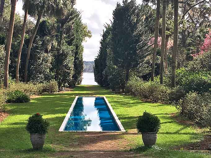 This reflecting pool mirrors the trees so perfectly you might walk into it by mistake.