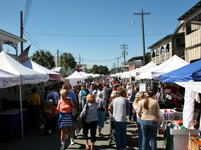 Crowds pack the charming island streets, drawn by the irresistible call of fresh Gulf seafood and small-town hospitality.