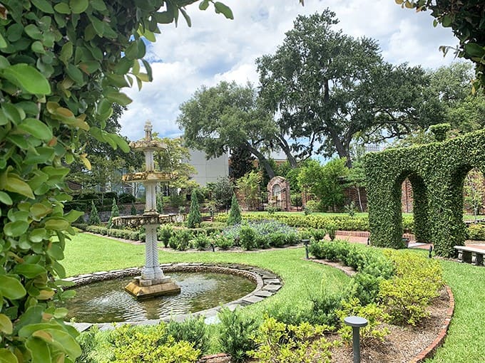 A formal garden with geometric patterns and a central fountain showcases the landscape design expertise at the Cummer Museum.