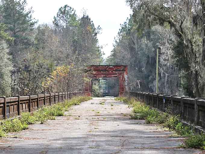 Nature has reclaimed the former lumber town, with only scattered foundations hinting at its bustling past.