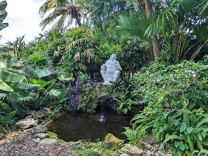 Nothing says "contemplative garden stroll" quite like stumbling upon a bearded sage who's been pondering life since the 1940s.