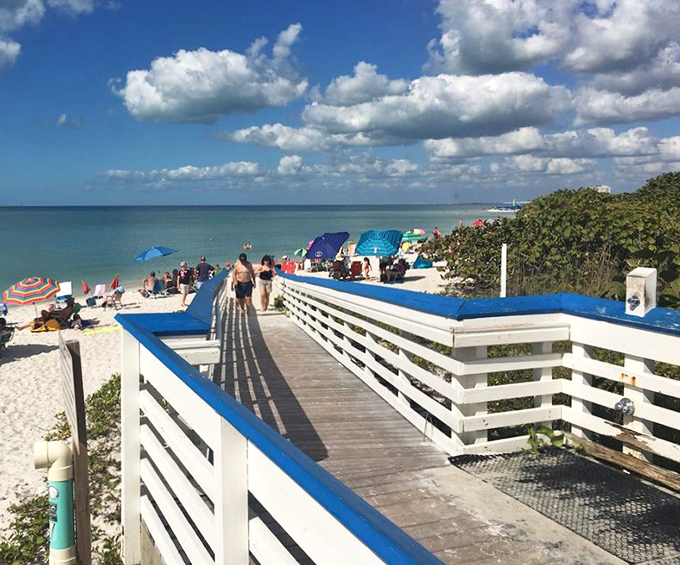 The final approach: Where wooden planks meet sugar-white sand, and everyday worries dissolve into Gulf waters.