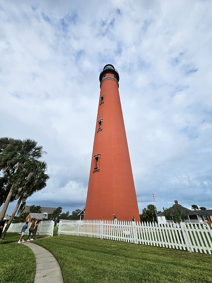 Looking up from below, the lighthouse's impressive stature becomes apparent &ndash; a testament to 19th-century engineering and determination.