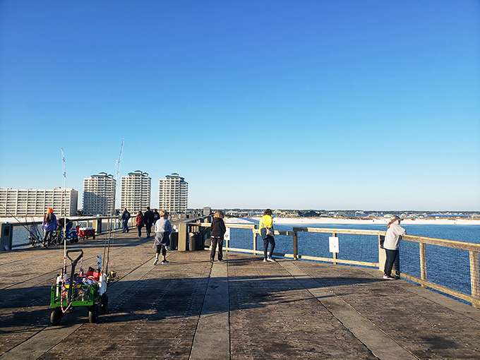Beach bliss stretches in both directions, sugar-white sand meeting emerald waters in perfect harmony.