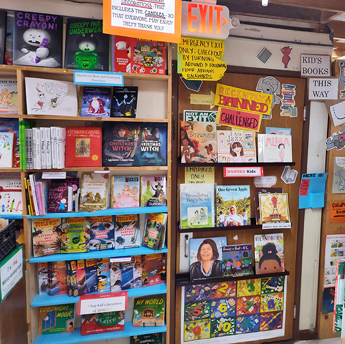 Childhood magic preserved: banned books displayed proudly alongside colorful children's titles, nurturing young minds and rebellious spirits alike.
