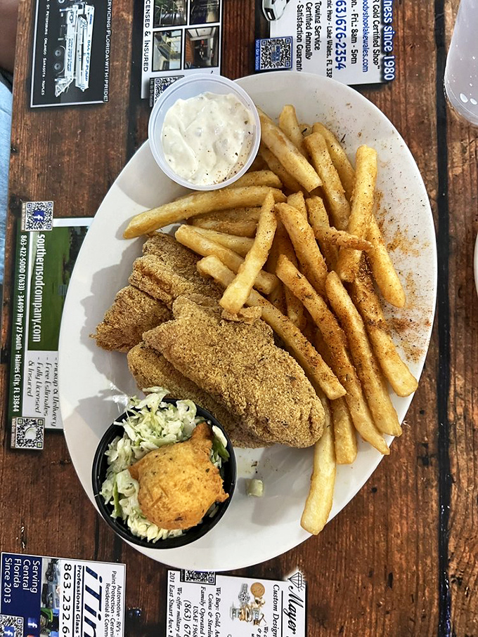 Golden-crusted catfish that shatters with each bite, revealing tender flaky fish within &ndash; Southern comfort on a plate.