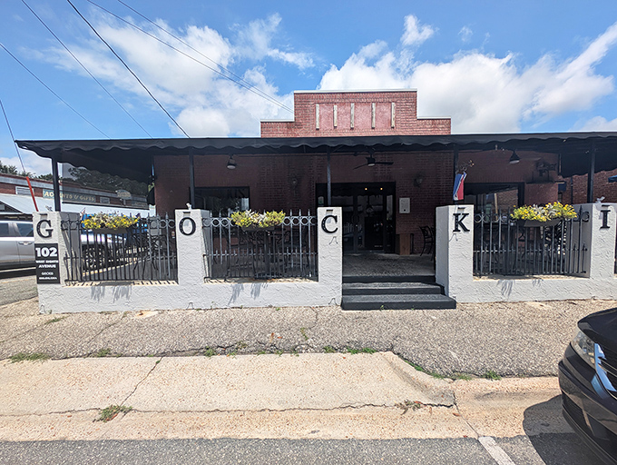 Gocki's distinctive entrance spells out a welcome in architectural letters, inviting visitors into a space where history has been thoughtfully preserved.