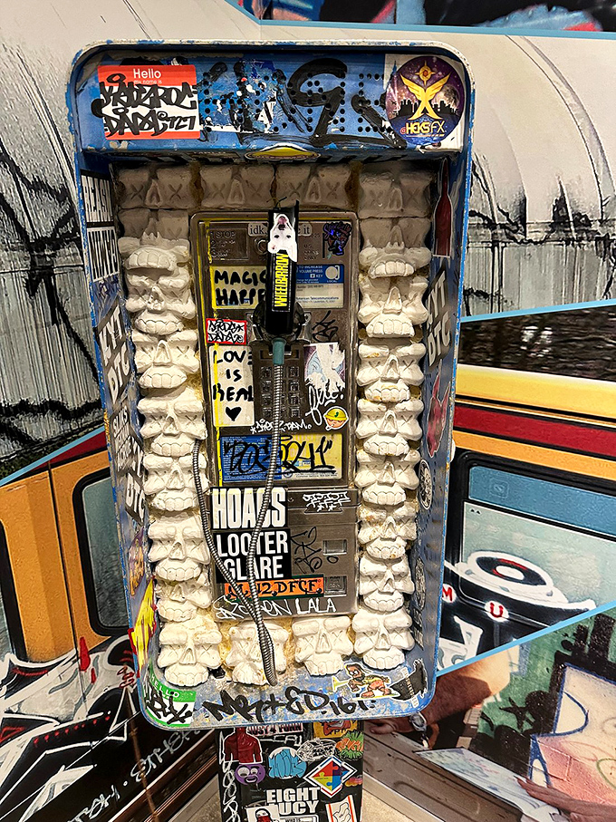 Graffiti-Covered Payphone Sculpture: This relic of communication past gets the full street treatment, transforming forgotten technology into a time capsule of artistic rebellion.