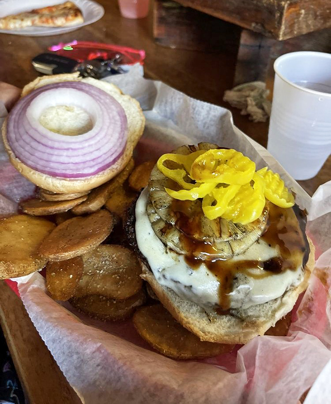 The legendary Hawaiian burger in all its glory! That grilled pineapple and banana pepper combo creates a flavor explosion that'll transport you to tropical bliss.