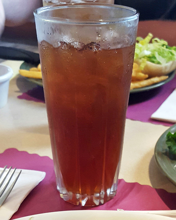 Sweet tea in a tall glass &ndash; the unofficial wine of the South &ndash; amber and refreshing, ready to cut through rich flavors and reset the palate.
