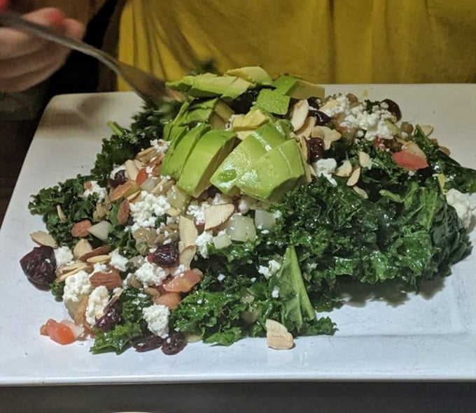 Not your basic bowl of leaves &ndash; this massaged kale mingles with cranberries, almonds and feta for guilt-free indulgence.