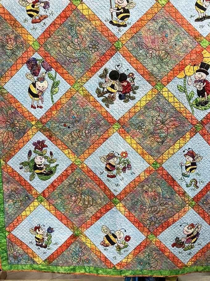 A whimsical quilt featuring busy bees demonstrates that even insects can inspire art when you're creatively inclined.