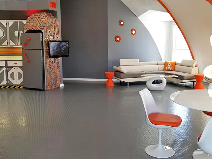 The main living area curves and flows like you're inside a benevolent alien's idea of the perfect beach vacation headquarters.