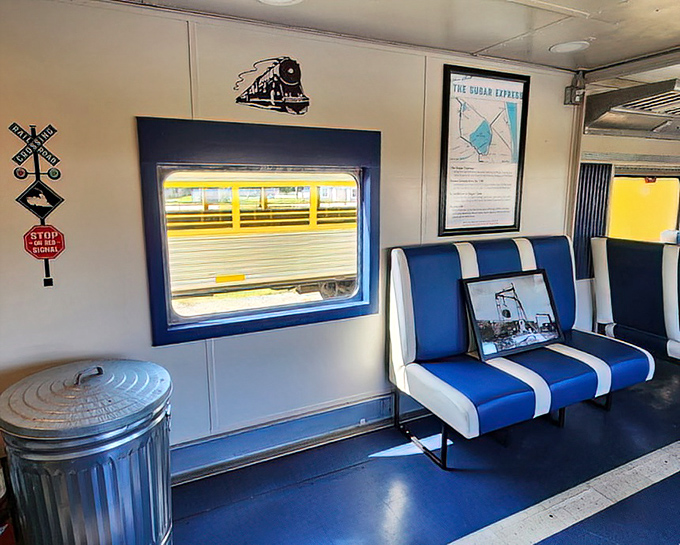 The Open Air Coach offers informative displays about the Sugar Express route, with comfortable seating that invites you to settle in.
