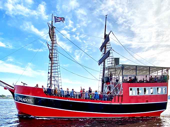 The ship's deck becomes a stage for maritime adventures, where everyday tourists transform into salty sea dogs for an afternoon.