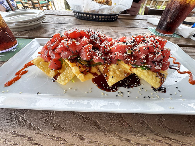 Poke nachos transform a sports bar staple into something worthy of a beachside feast, with fresh tuna playing the starring role.