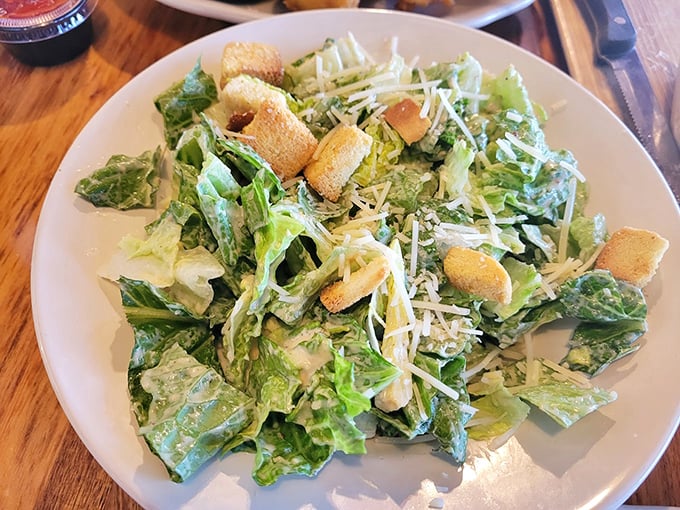 A properly dressed Caesar salad provides the perfect opening act before the meaty main event steals the show.