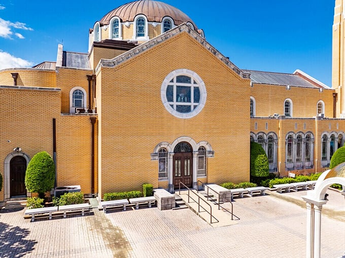 St. Nicholas Greek Orthodox Cathedral stands as the spiritual heart of Tarpon Springs, its golden dome gleaming against Florida's blue sky.