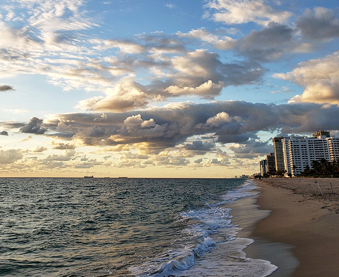 Dawn breaks over Lauderdale-by-the-Sea, painting the sky in watercolor hues that no Instagram filter could possibly improve upon.