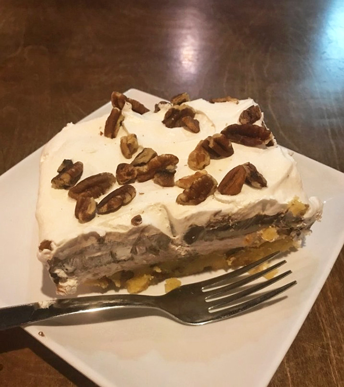 The Mississippi Mud Pie doesn't just end a meal – it creates a moment of sweet, pecan-topped bliss worth saving room for.