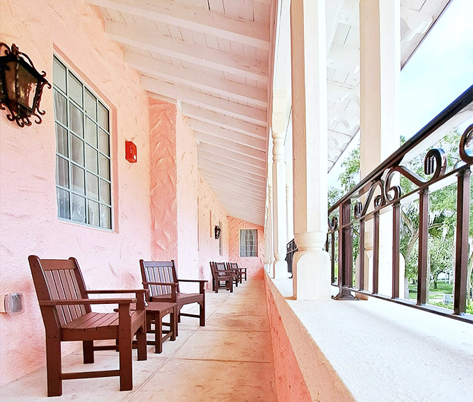 Veranda Seating: The veranda's wooden chairs stand at attention, ready for guests to sink in with a good book or better conversation as Florida breezes play matchmaker.
