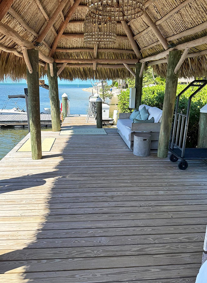 A thatched-roof gazebo offers shaded luxury by the water &ndash; the perfect spot to finish that novel you've been meaning to read.