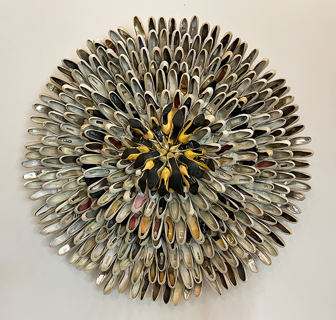 Willie Cole's "With a Heart of Gold" transforms ordinary shoe soles into an extraordinary mandala &ndash; everyday objects reborn as cosmic beauty.
