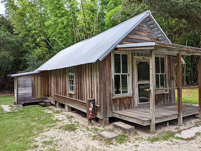 This rustic cabin whispers tales of simpler times, when "off the grid" wasn't a lifestyle choice but just... life.