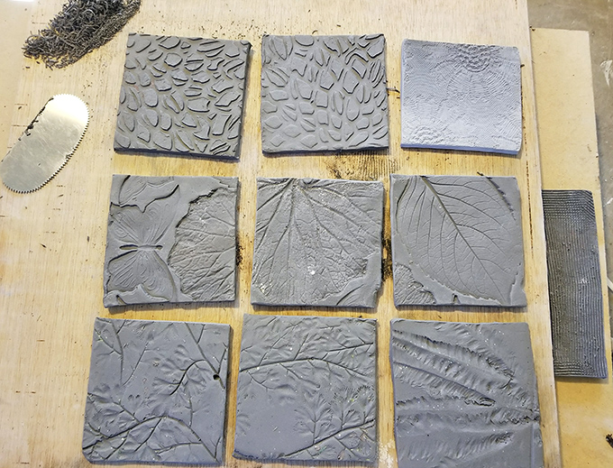 Nature-inspired clay tiles capture the textures of leaves, seeds, and organic patterns &ndash; simple impressions that become artistic studies in form and detail.