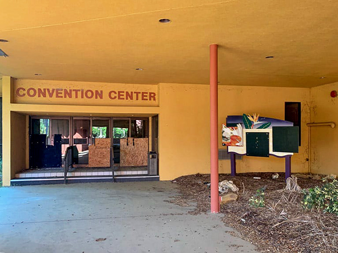 "Convention Center" still proudly announces itself, though the only conventions happening now involve squatters and possibly some very entrepreneurial wildlife.
