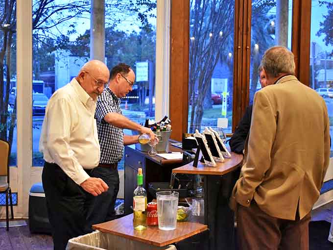 Patrons gather at the bar before showtime, that pre-performance buzz of anticipation as intoxicating as any beverage being served.