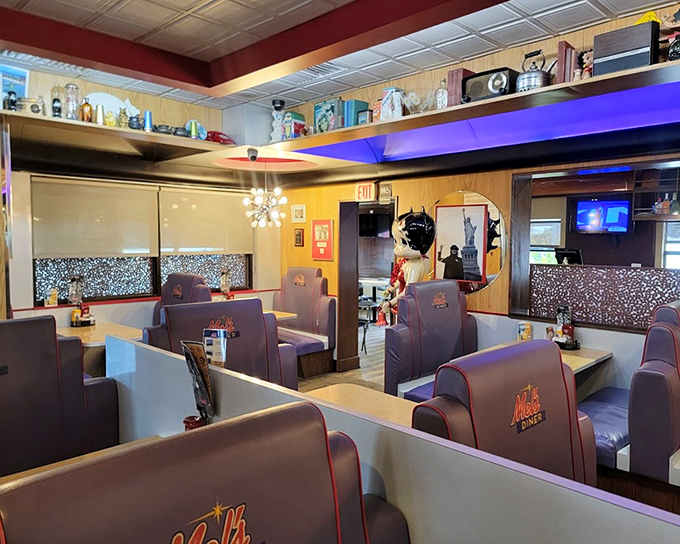 Cozy booths invite intimate conversations while the ambient lighting flatters everyone – no wonder locals return weekly for their comfort food fix.