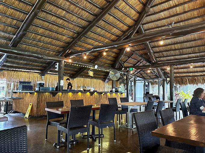 Rustic elegance defines Schnebly's thatched-roof tasting pavilion, where tropical breezes complement every sip.