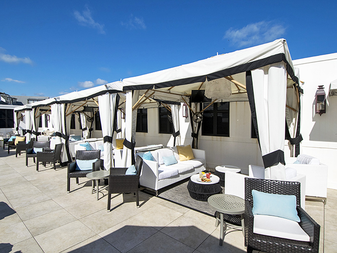 Cabanas on the rooftop offer shaded luxury for those who prefer their sunshine with a side of sophistication.