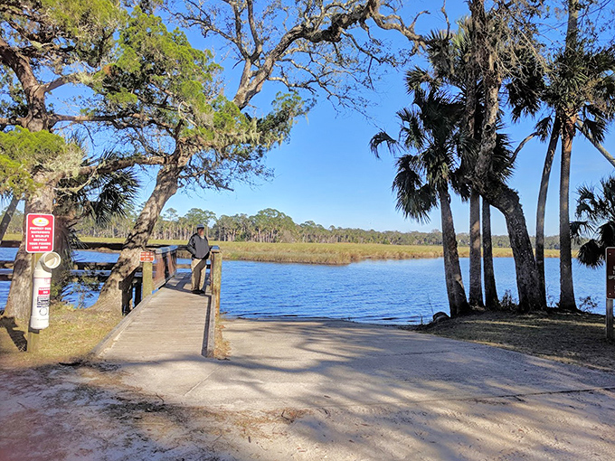 A peaceful dock extends into Bulow Creek, offering the perfect launching point for kayaking adventures or contemplative fishing sessions.