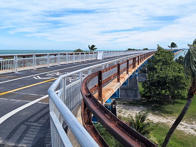 Sun-bleached railings frame the pathway across azure waters, where the journey itself rivals any destination you might have in mind.