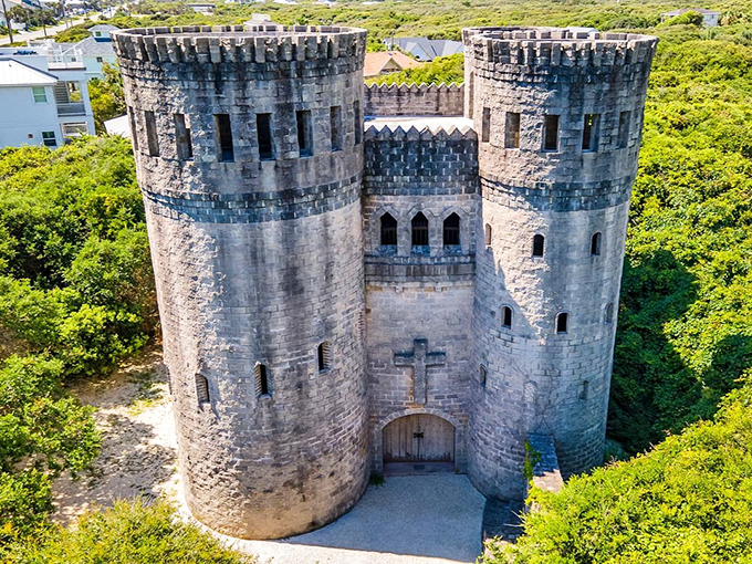 Castle Otttis rises from the Florida landscape like a medieval Irish fortress, its stone towers creating a striking silhouette against the sky.