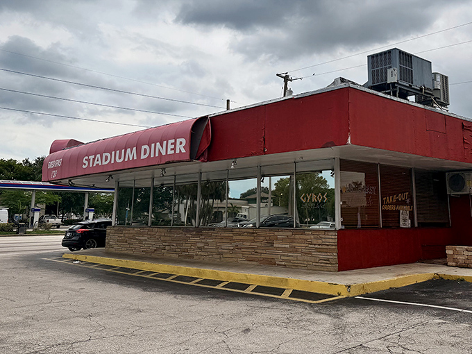 The simple stone exterior and bold red signage of Stadium Diner have been a familiar sight to Miami residents for decades.
