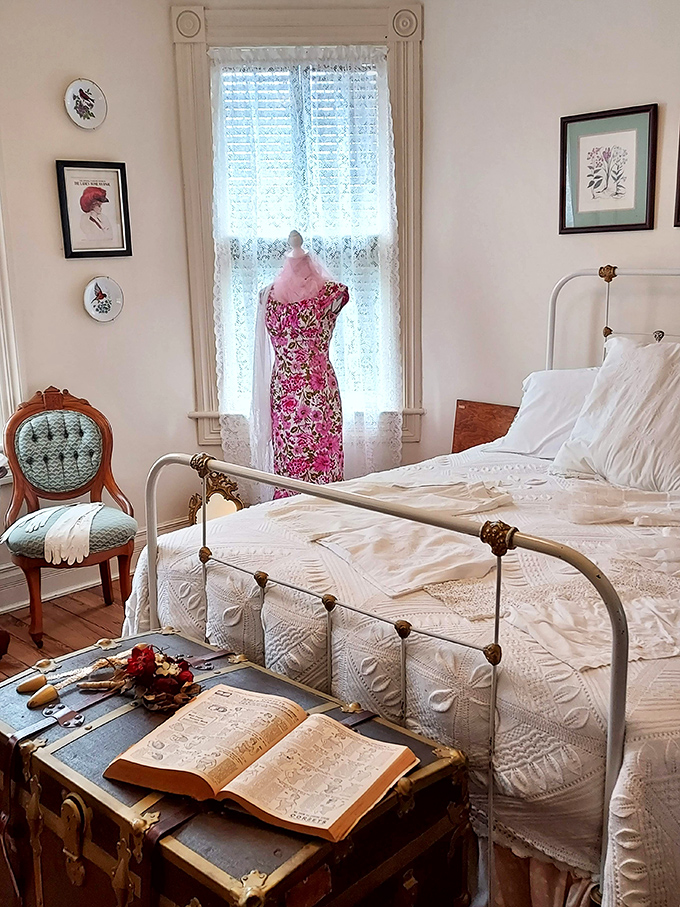 This bedroom's vintage dress form stands like a patient ghost, eternally waiting for its owner to return from a Victorian social call.