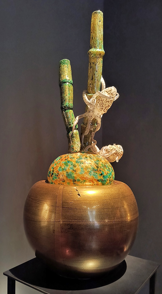 Bamboo-inspired glass sculptures reach skyward, demonstrating how Chihuly transforms natural inspirations into something entirely new and magical.