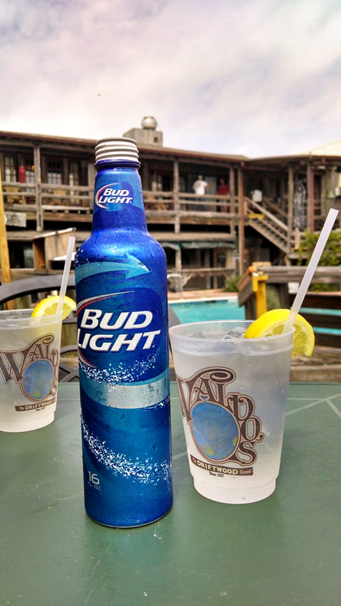 Nothing says Florida afternoon like a frosty Bud Light aluminum bottle sweating in the sunshine beside Waldo's signature cup.