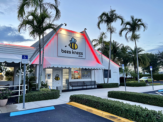 Bees Knees Diner's distinctive A-frame and neon signage beckon comfort food enthusiasts with the promise of nostalgic flavors reimagined.