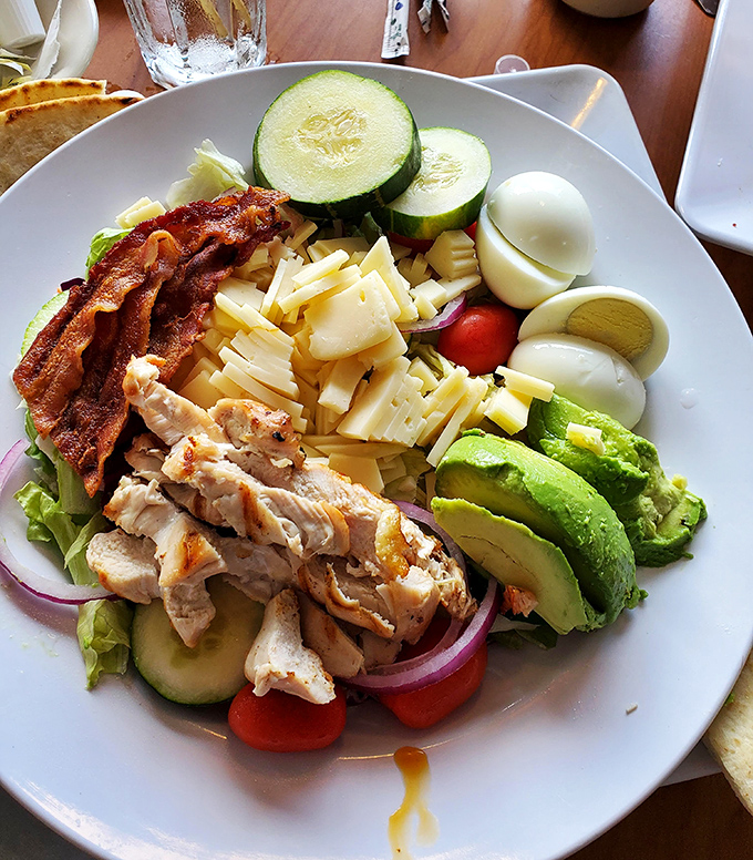 A salad so beautiful it belongs in the Louvre. Protein, veggies, and avocado arranged with the precision of a Renaissance painting&mdash;and twice as satisfying.