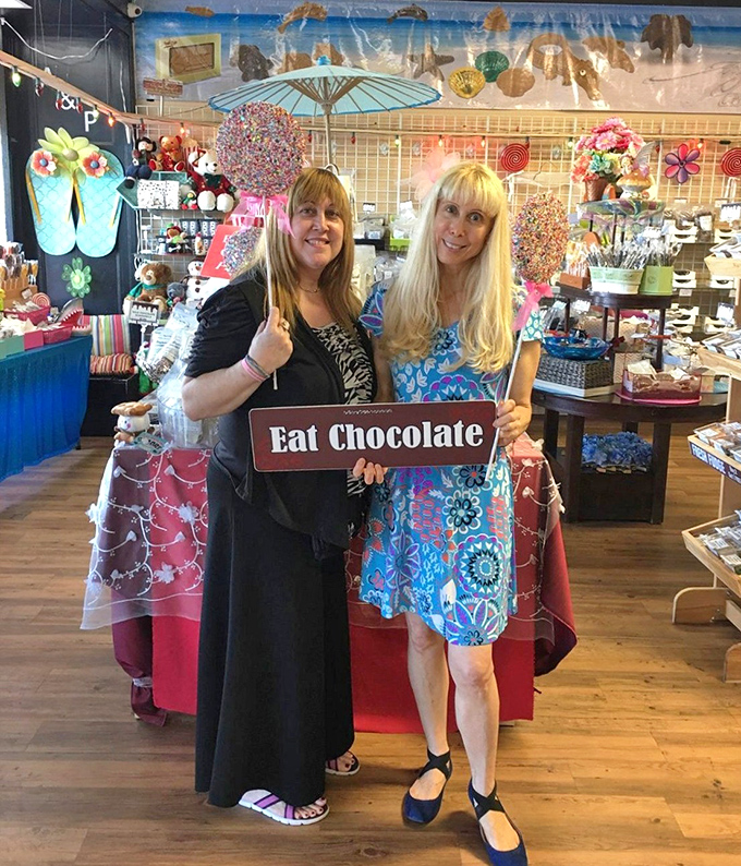 Customers: Chocolate enthusiasts proudly display their "Eat Chocolate" philosophy – a mantra we should all live by.