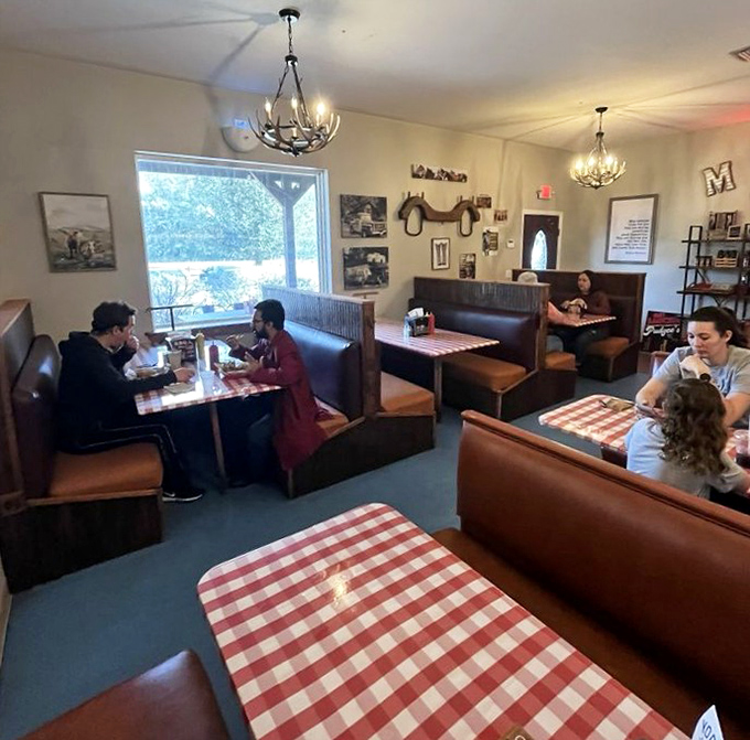 The dining room hums with the satisfied murmurs of locals who've found their happy place among leather booths and honest food.