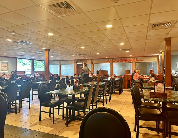 The bustling dining room hums with the satisfied murmurs of patrons who've discovered why locals have been flocking here for generations.