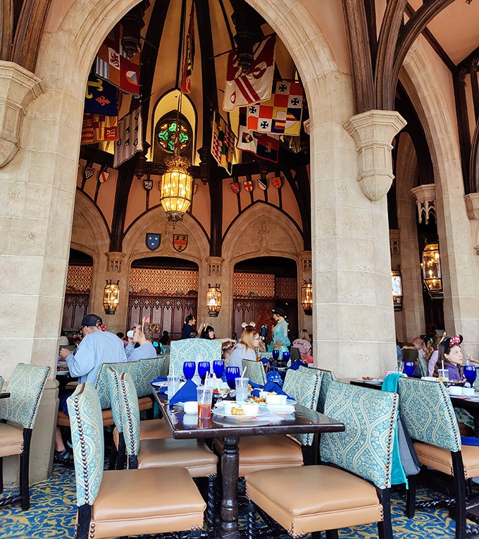 Guests from kingdoms far and wide gather in the grand hall, where every table offers a view fit for royalty.