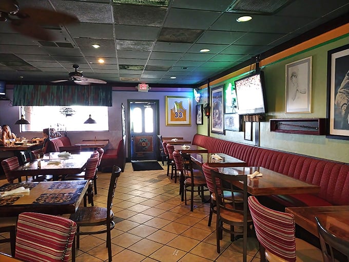 The dining area balances casual comfort with festive charm&mdash;red booths invite you to settle in for a proper feast.