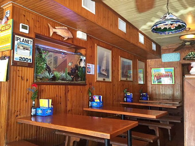 Simple wooden tables and benches invite conversation and community &ndash; this is dining that's about the food and the folks sharing it.
